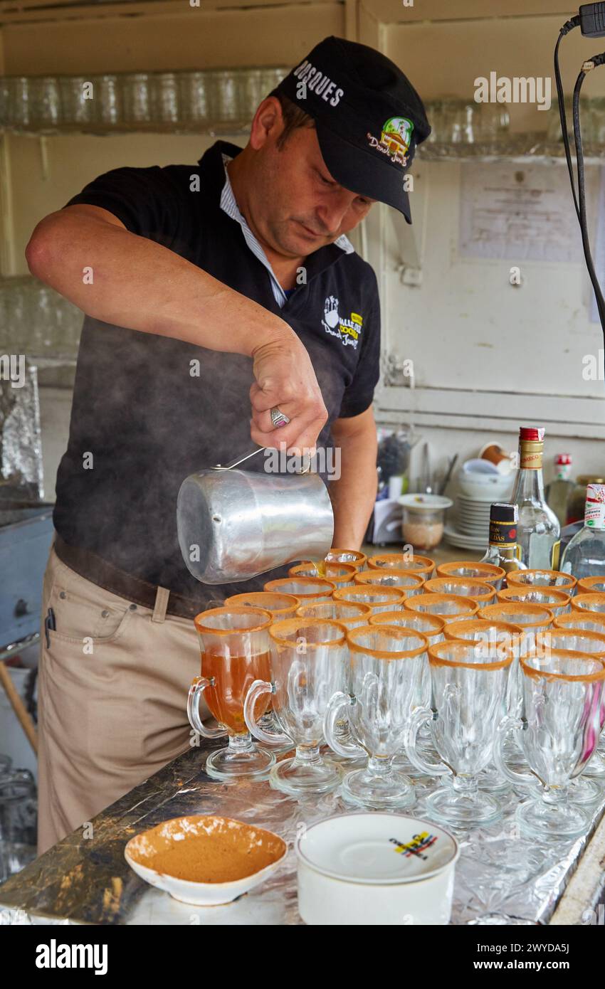 Preparing Canelazo, Panela with passion fruit, Valle del Cocora ...