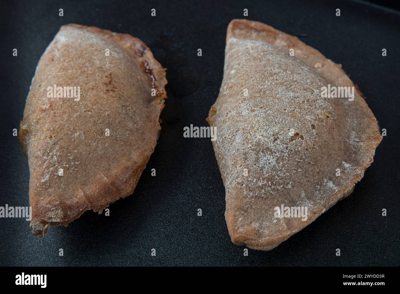 Leek pastry made from buckwheat flour. Homemade savory hand pies ...