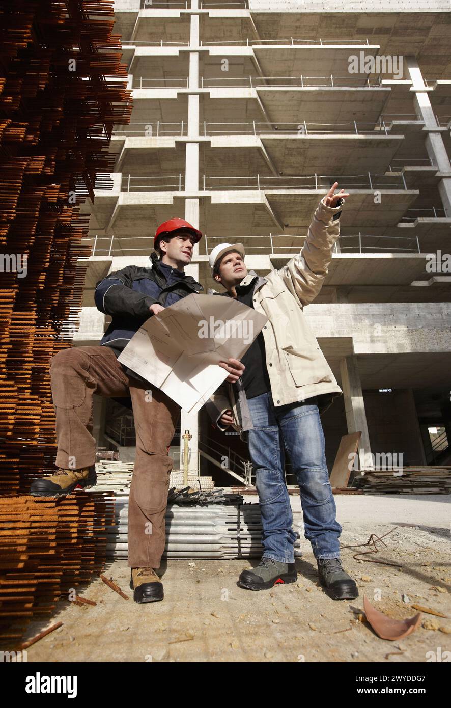 Architect and construction worker, personal protective equipment ...