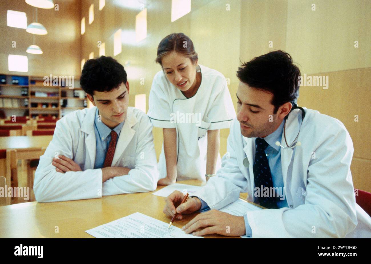 Attentive doctors and nurses listening hi-res stock photography and ...