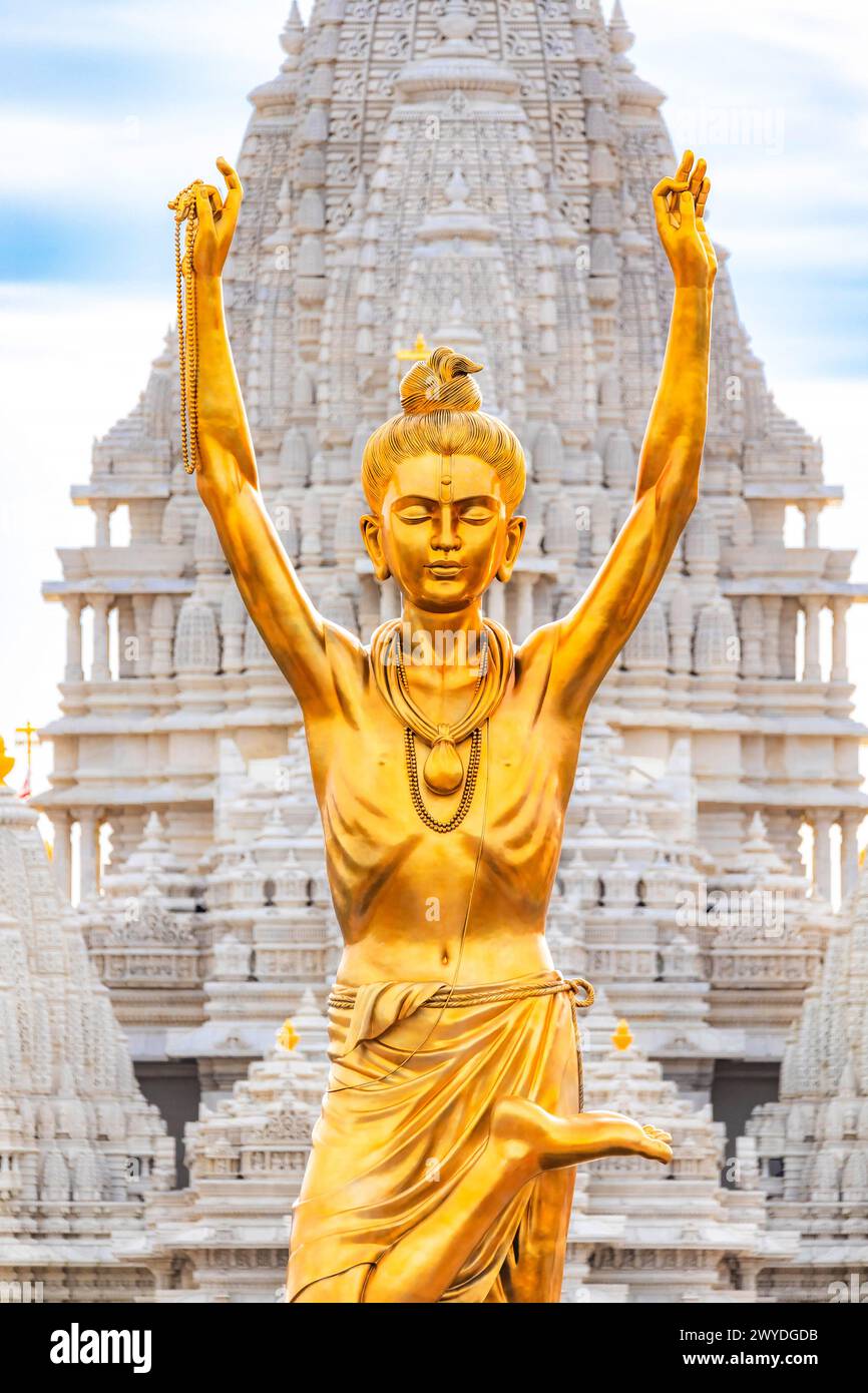 Statue of Nilkanth Varni with Akshardham Mahamandir temple in the back ...