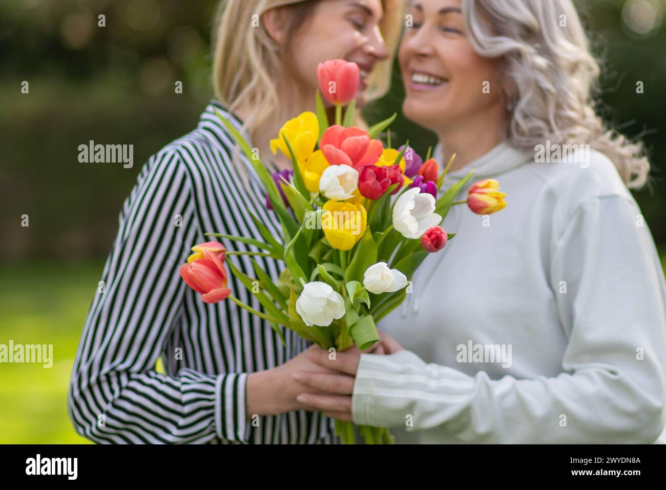 Mother hugs daughter on hi-res stock photography and images - Alamy