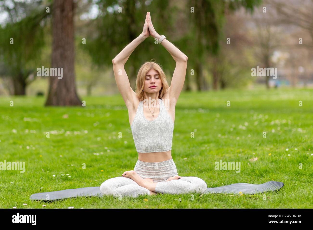 Woman in lotus pose hi-res stock photography and images - Alamy