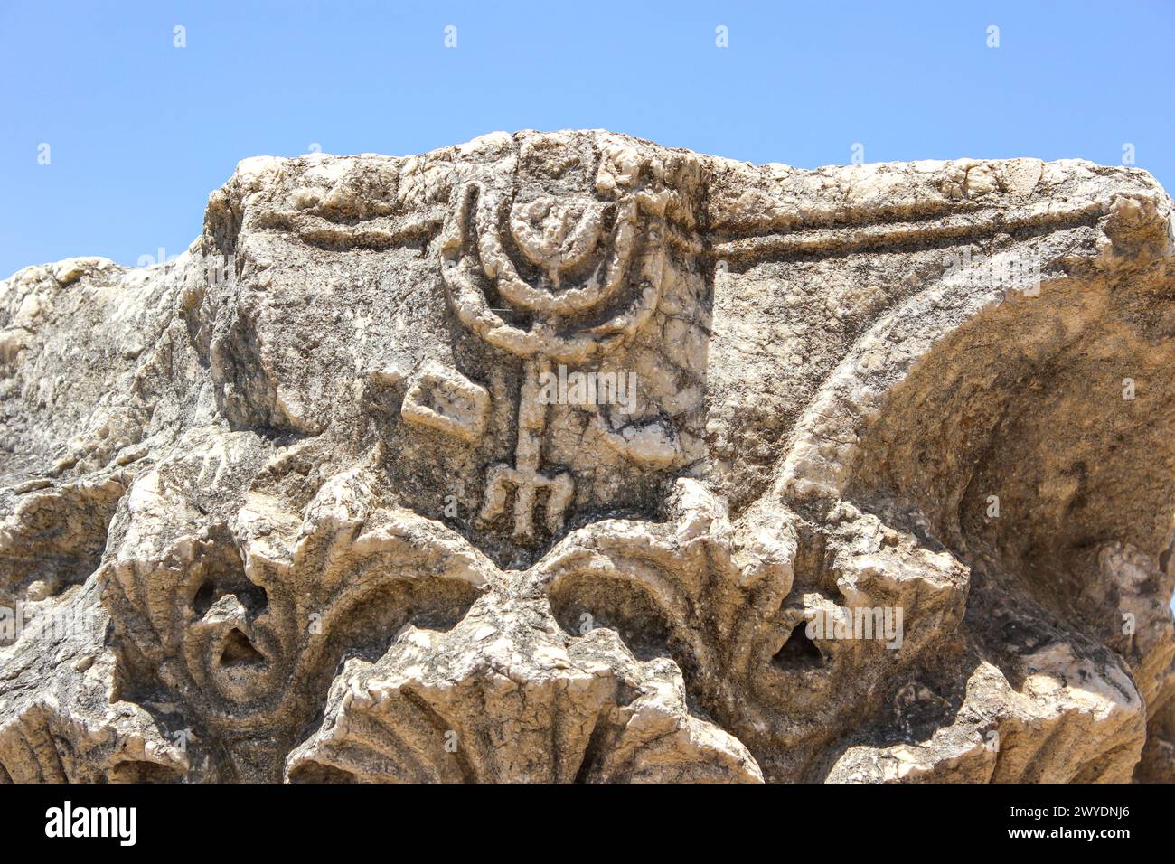 The weathered menorah on this ancient pillar capital at the White ...