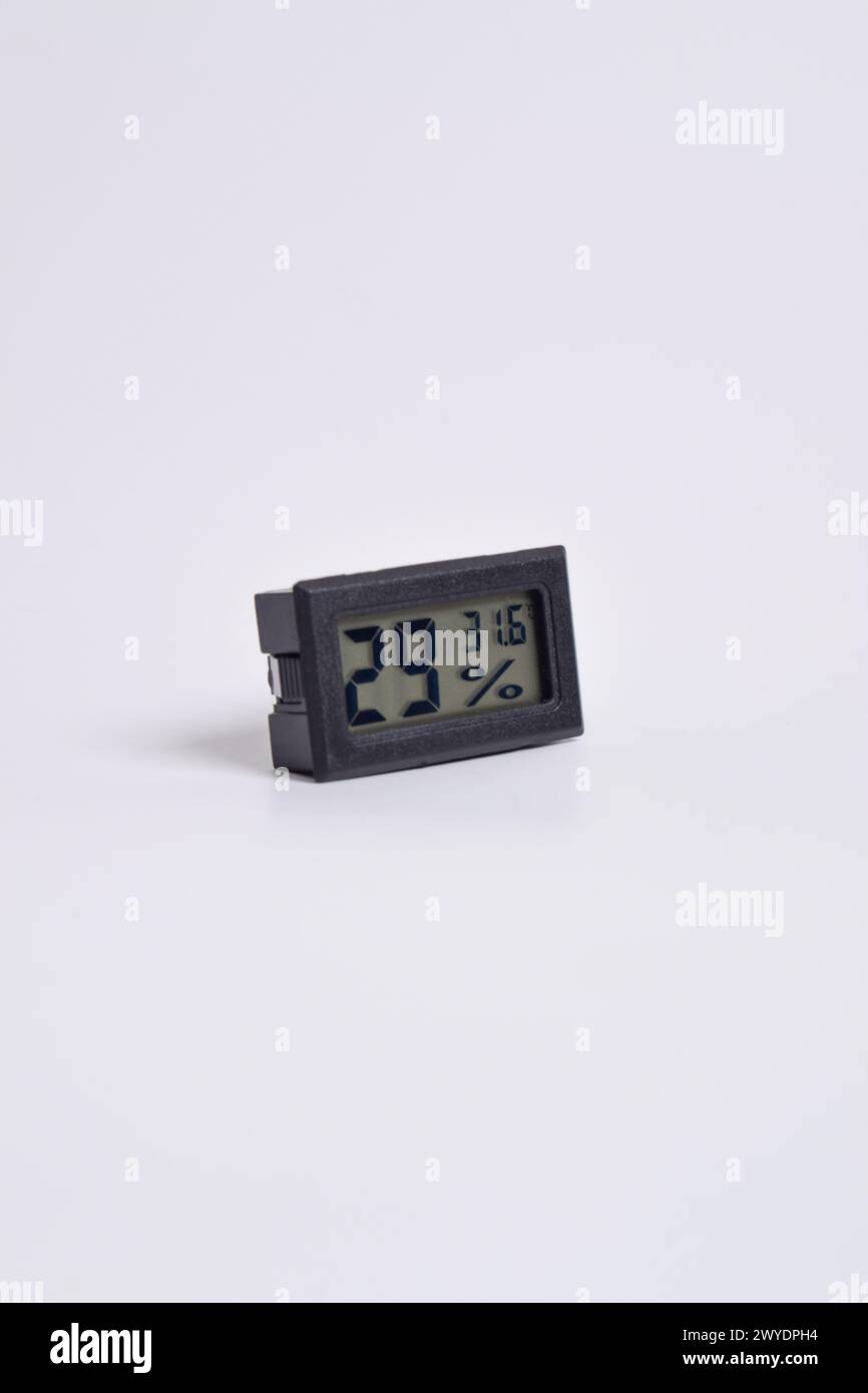 Digital thermo-hygrometer isolated on white background Stock Photo - Alamy