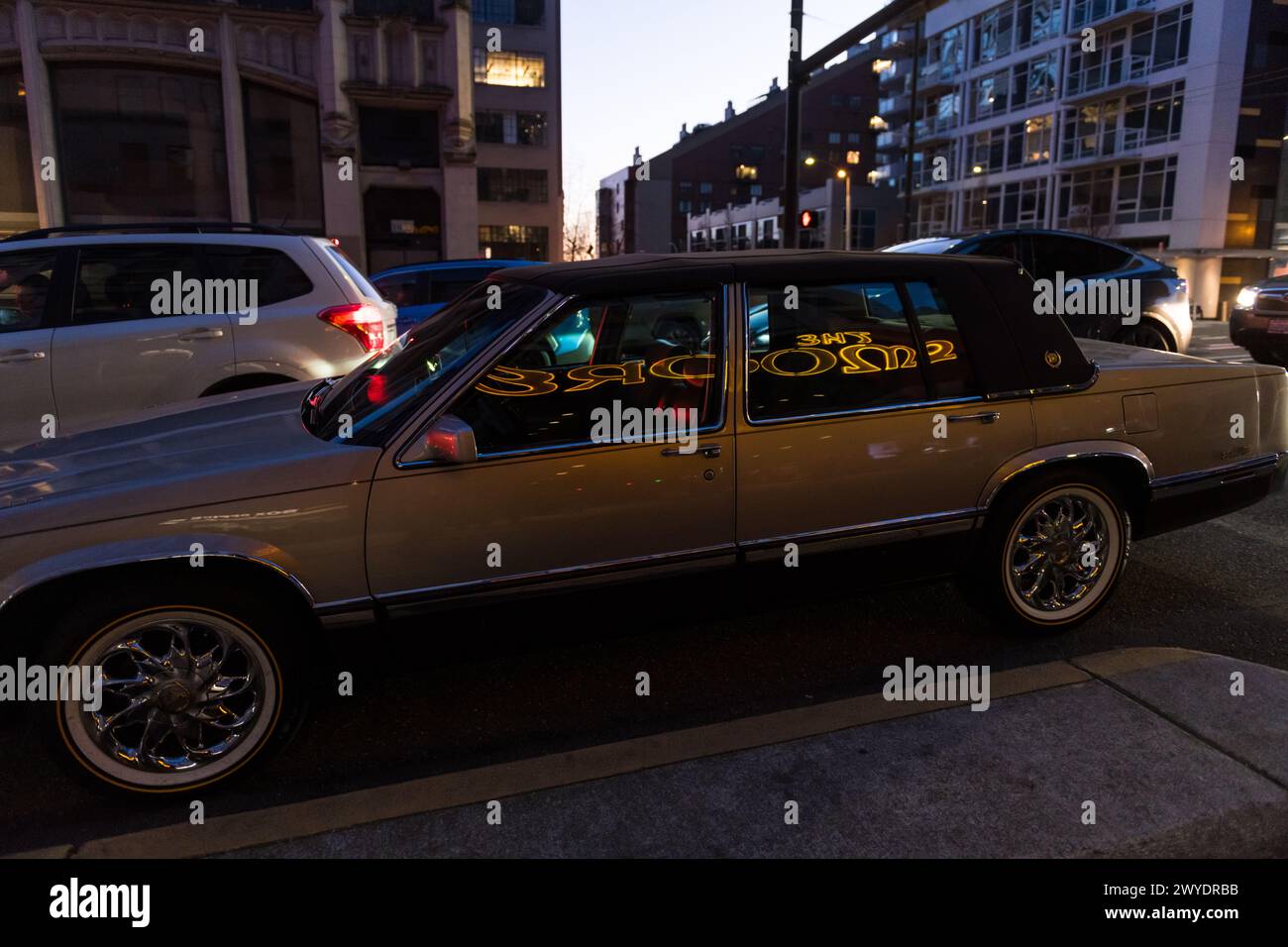 Seattle, USA. 15 Mar, 2024. A classic car parked outside the Moore ...