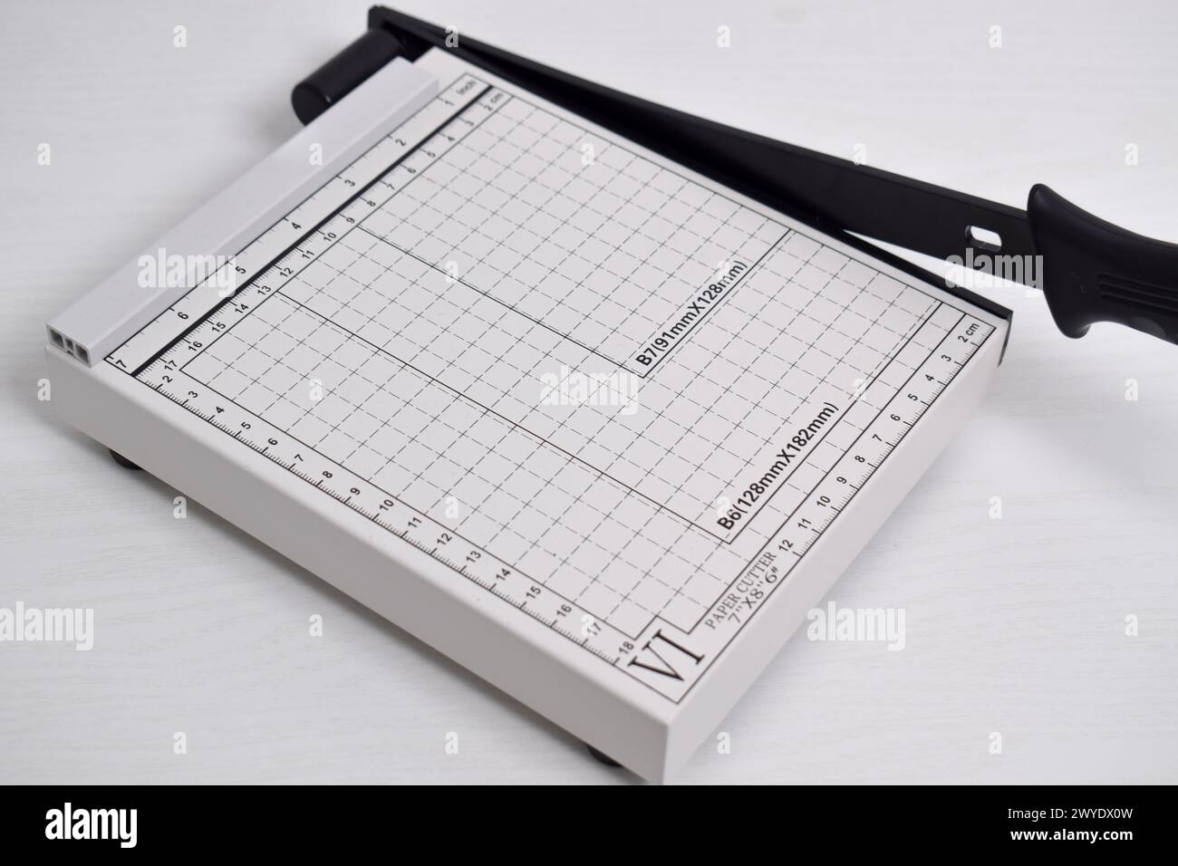 White Paper Cutter isolated on white background Stock Photo - Alamy
