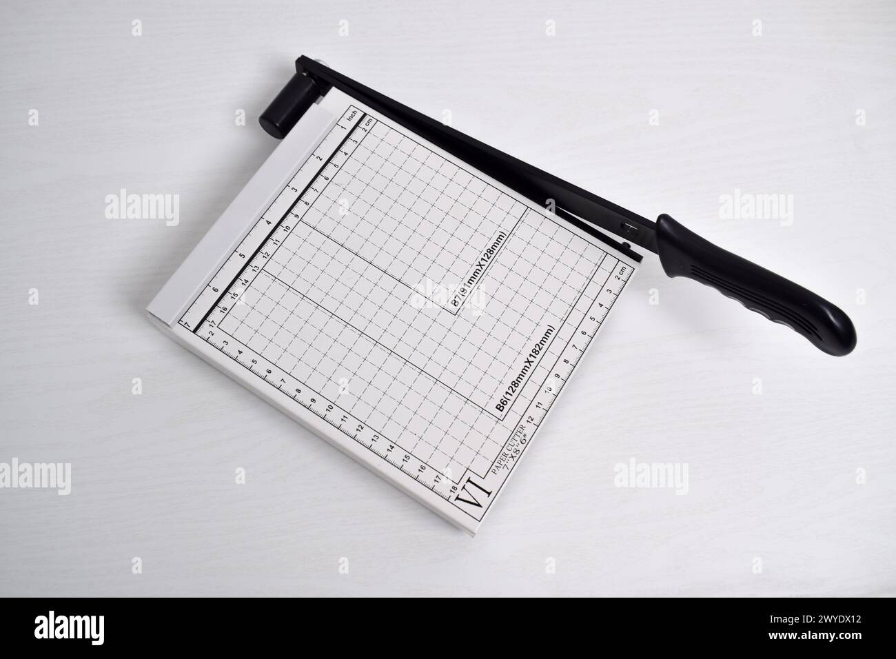 White Paper Cutter isolated on white background Stock Photo - Alamy