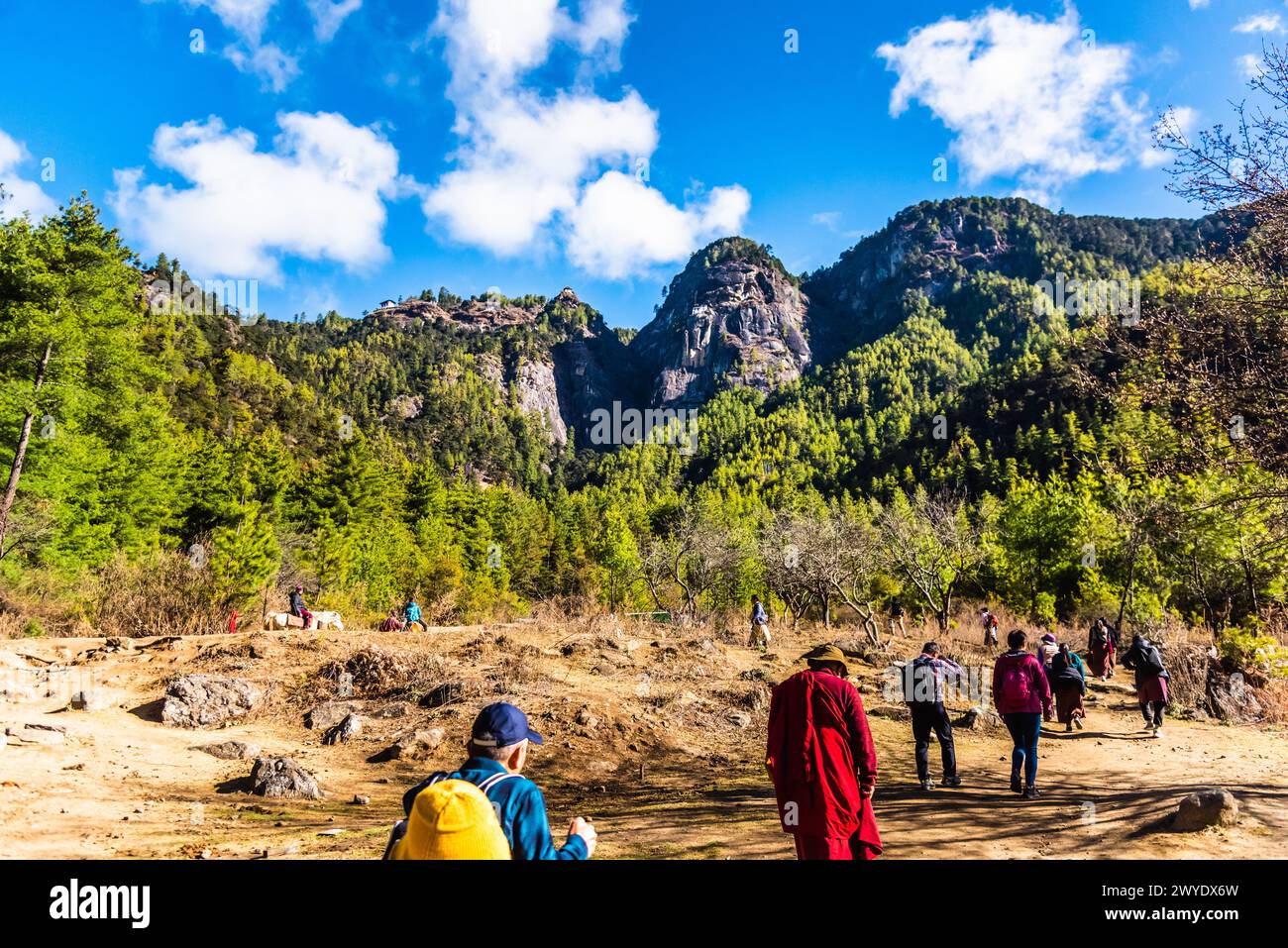 Paro Taktsang, Bhutan - Mar 24,2024 Travellers hiking towards Tiger's ...
