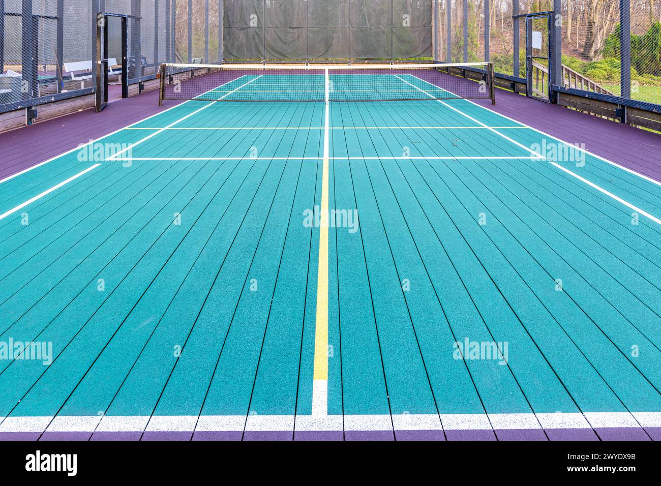 Elevated Platform Tennis, Paddle Ball courts with yellow pickelball ...