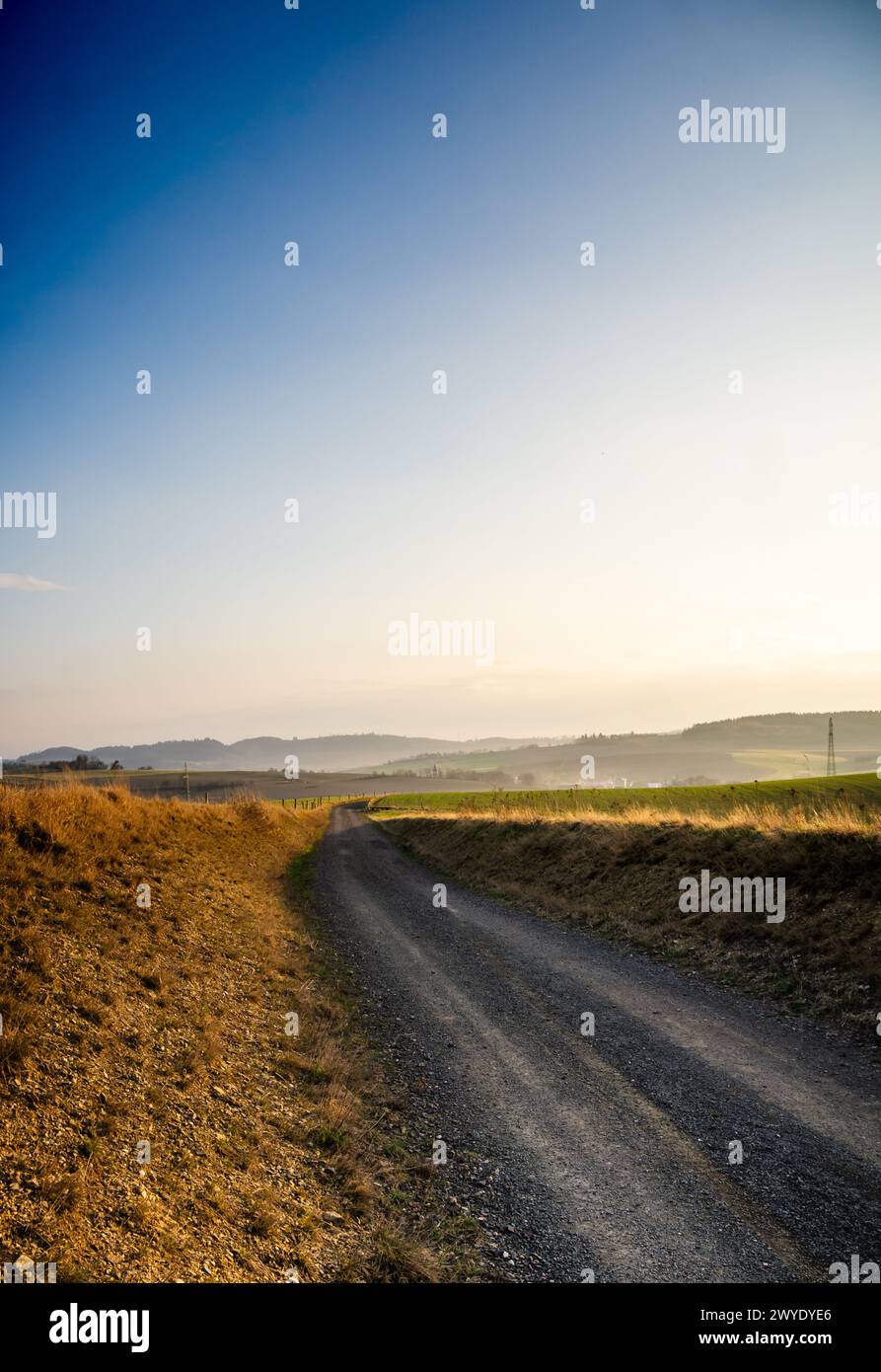 Dirt Road Cutting Through Field Stock Photo - Alamy