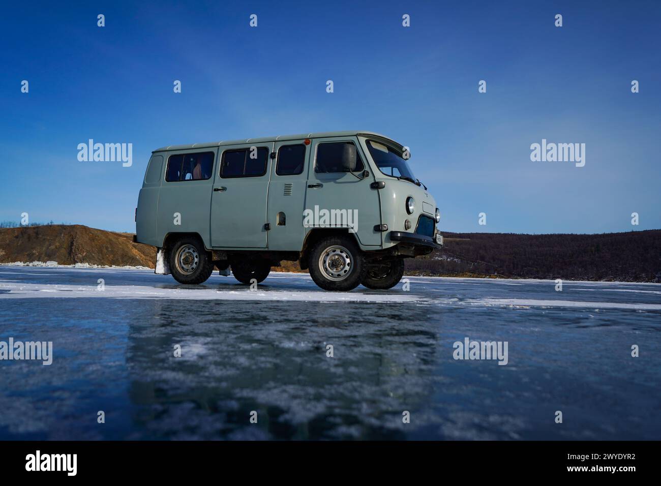 A Russian minivan is seen on the frozen Lake Baikal, Siberia, Russia on ...