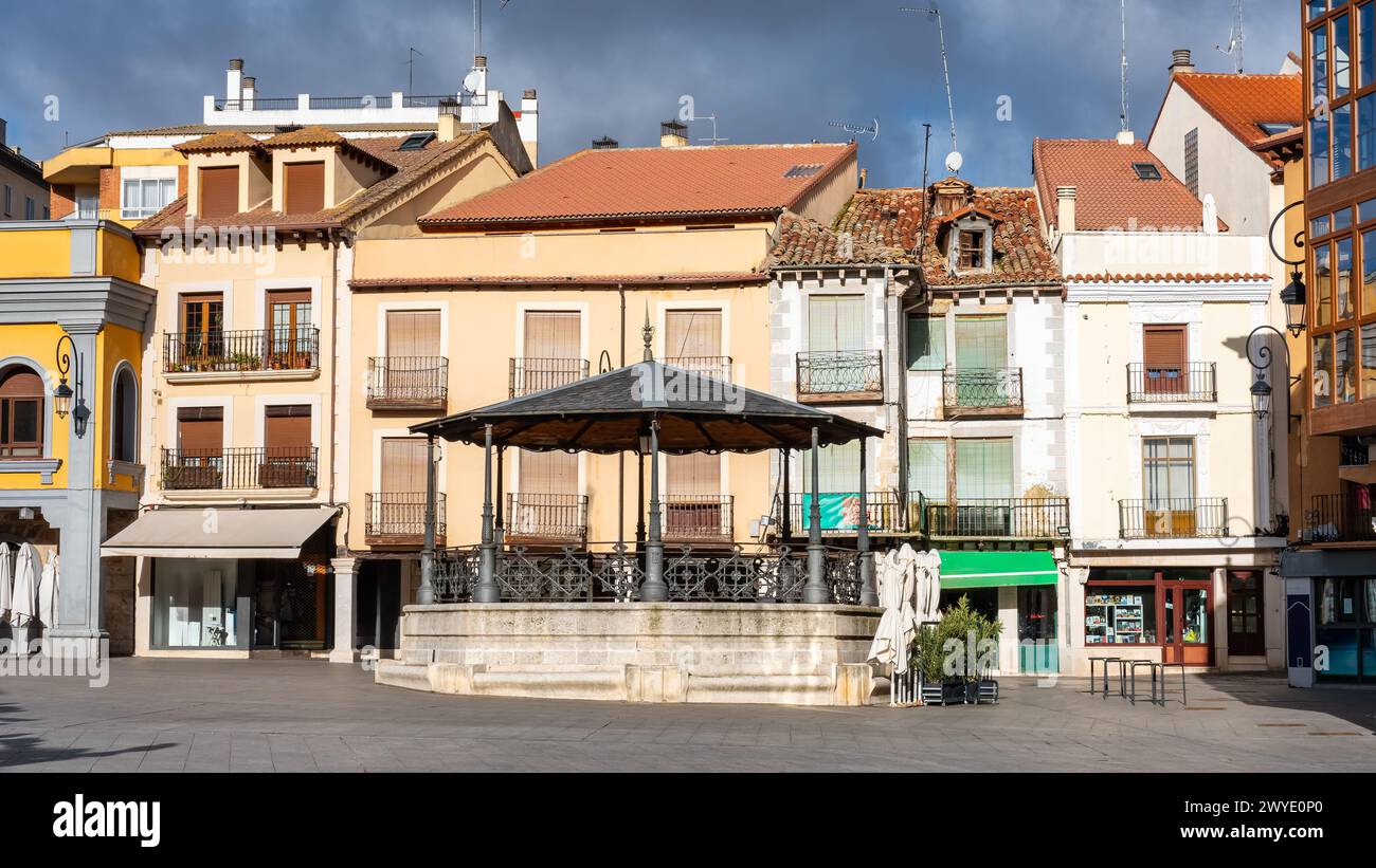 Facades of quaint old houses around the main square of Aranda de Duero ...