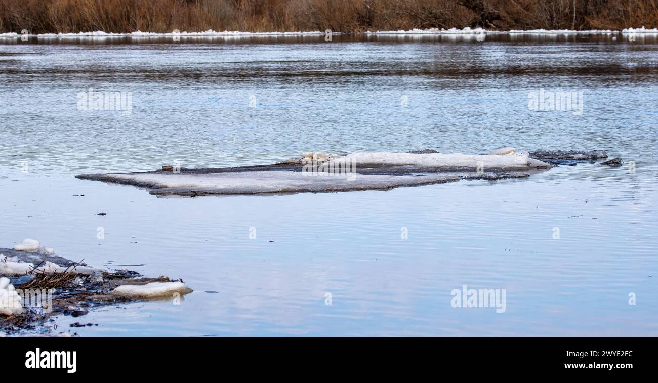 A landscape of an ice drift (ice-boom, debacle) on the northern river ...