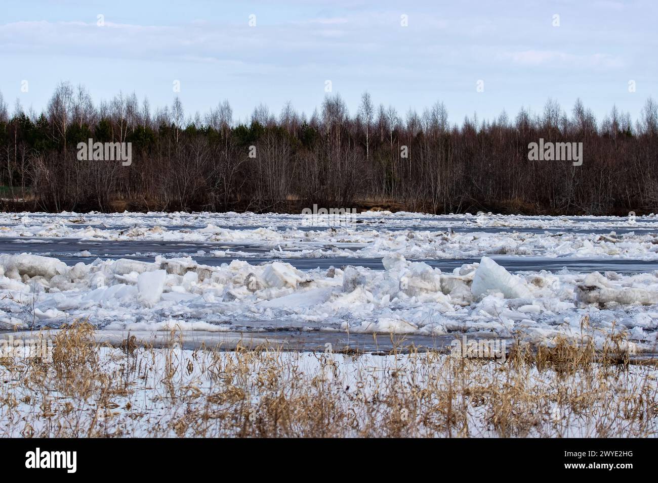 A landscape of an ice drift (ice-boom, debacle) on the northern river ...