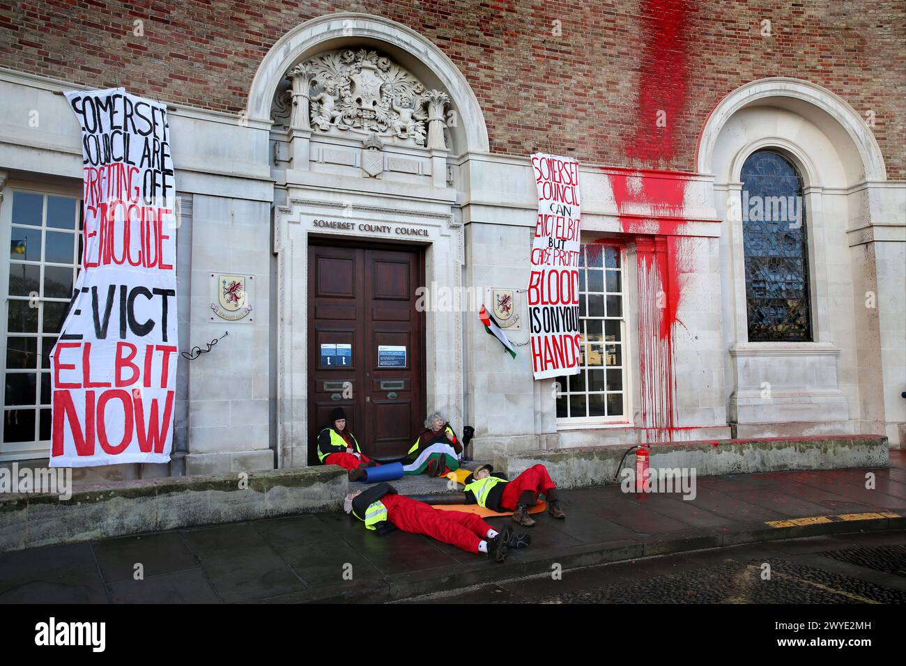 Protesters leave banners hanging on the exterior of County Hall and ...
