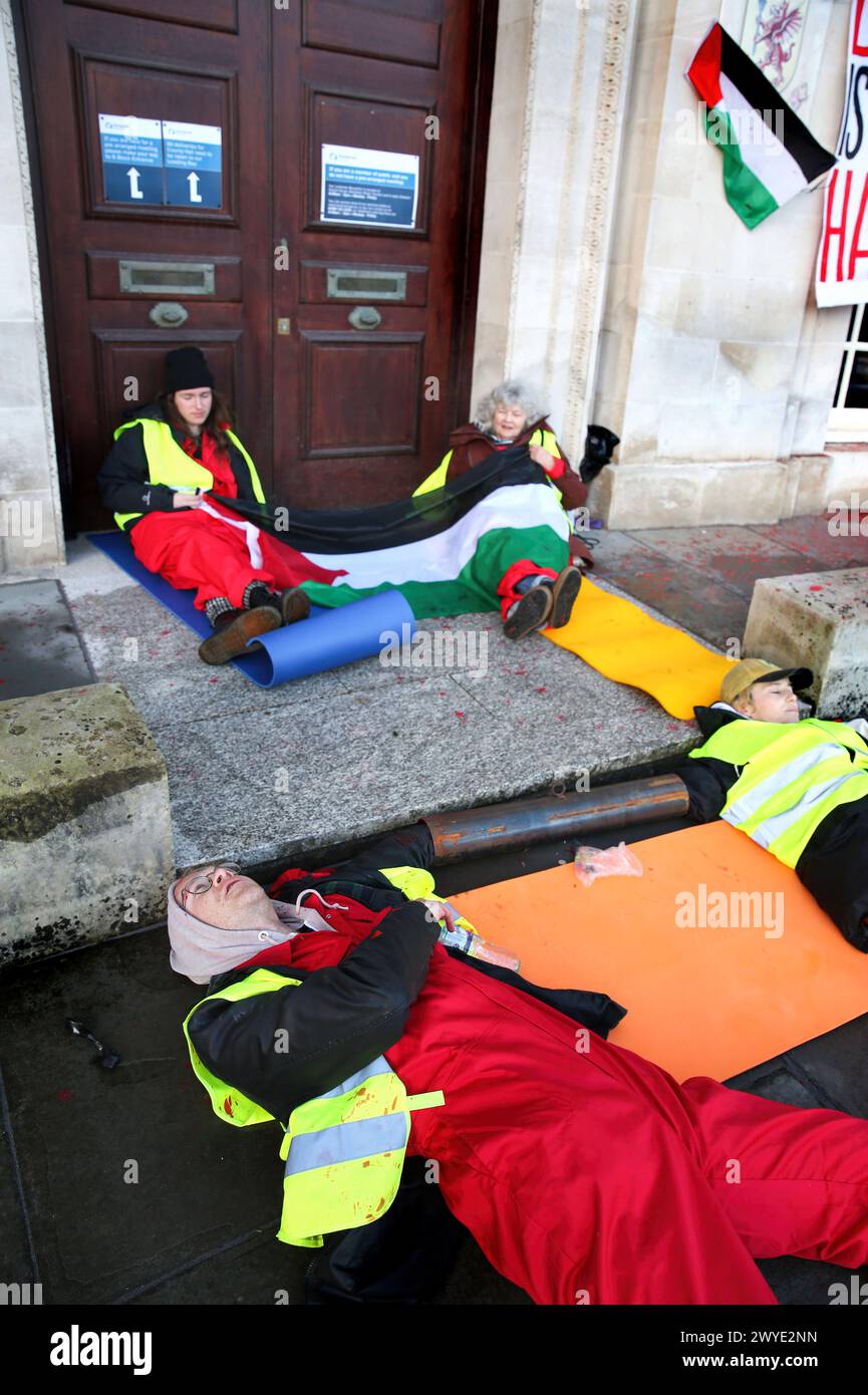 Palestine Action actionists sit locked-on in pairs, during a ...
