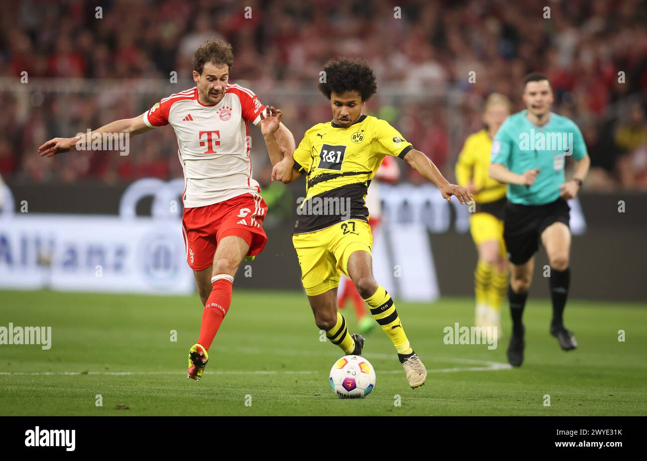 Karim Adeyemi of Borussia Dortmund Leon Goretzka of Bayern Muenchen ...