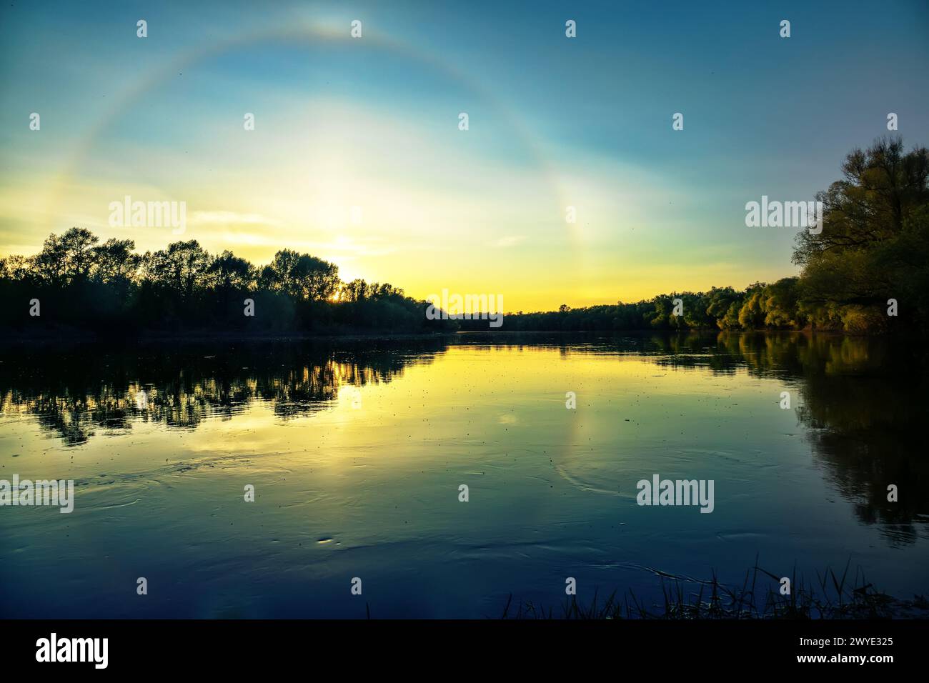 Unusual atmospheric phenomena. Very bright double halo (parhelic ring ...
