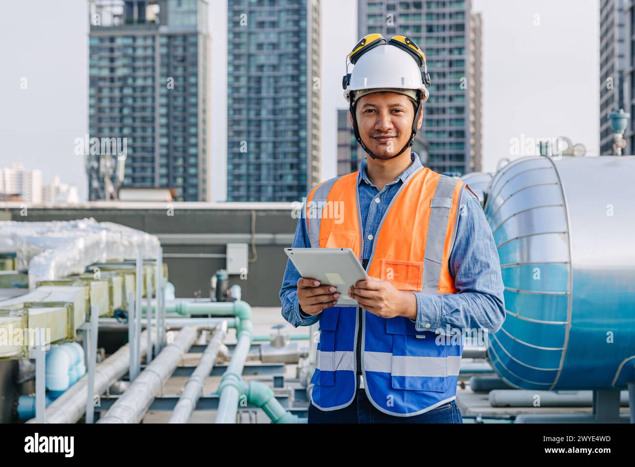 portrait happy smiling engineer male work work check water boiler tank ...