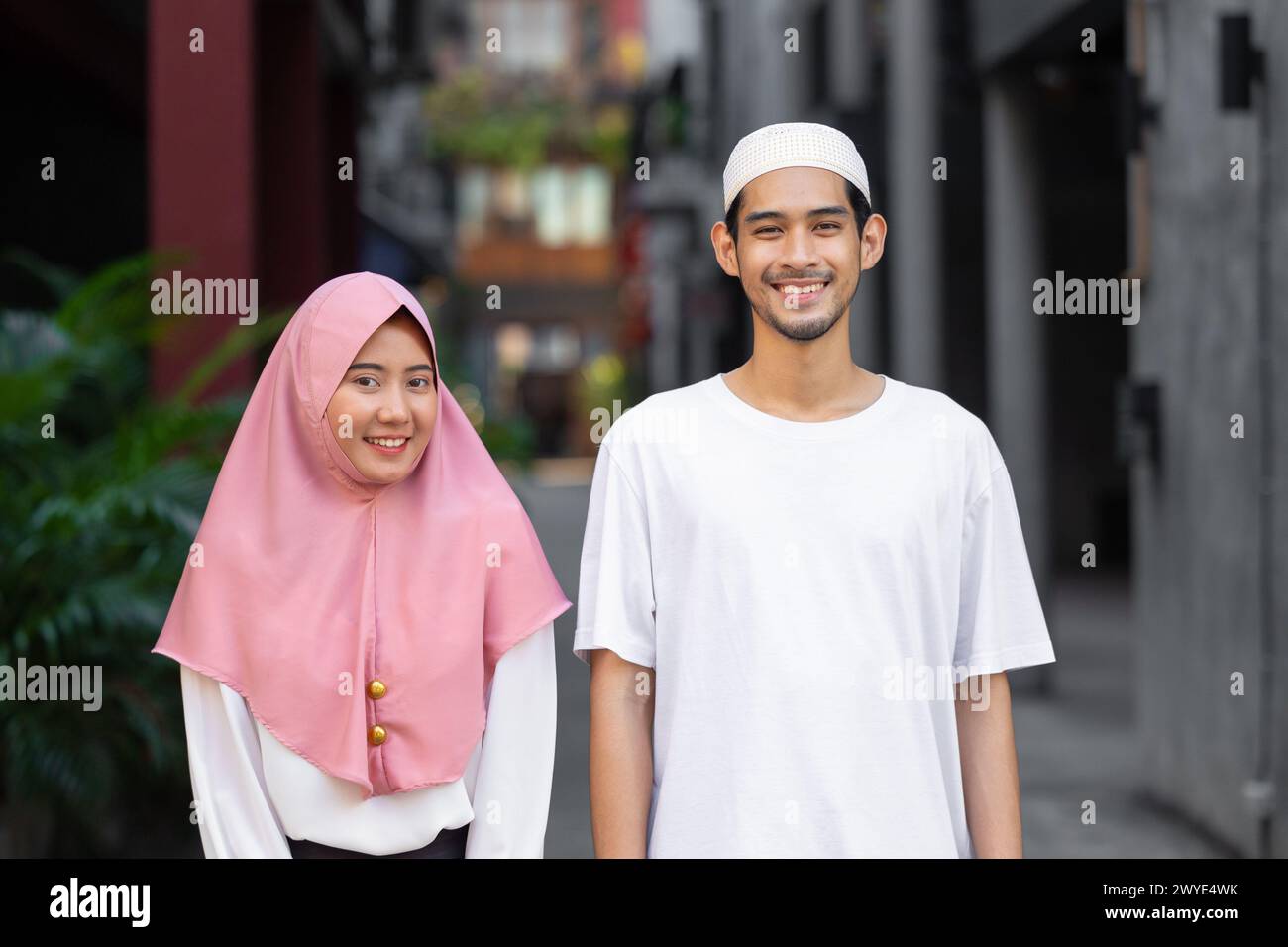 portrait happy muslim teen man and women couple lover friend standing ...