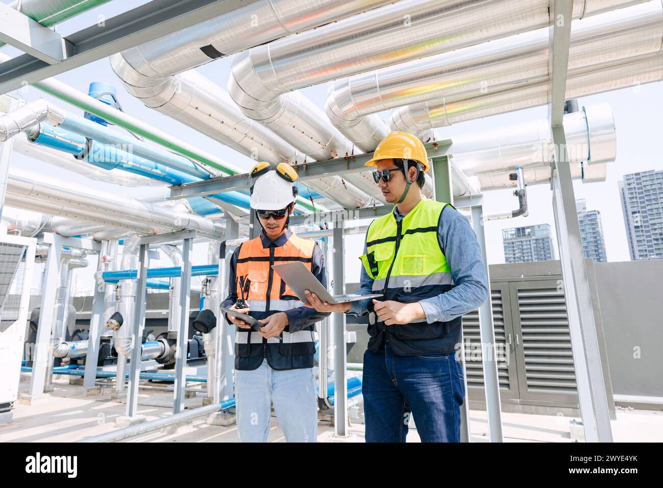 engineer man working with water pipe line in gas oil industry workplace ...