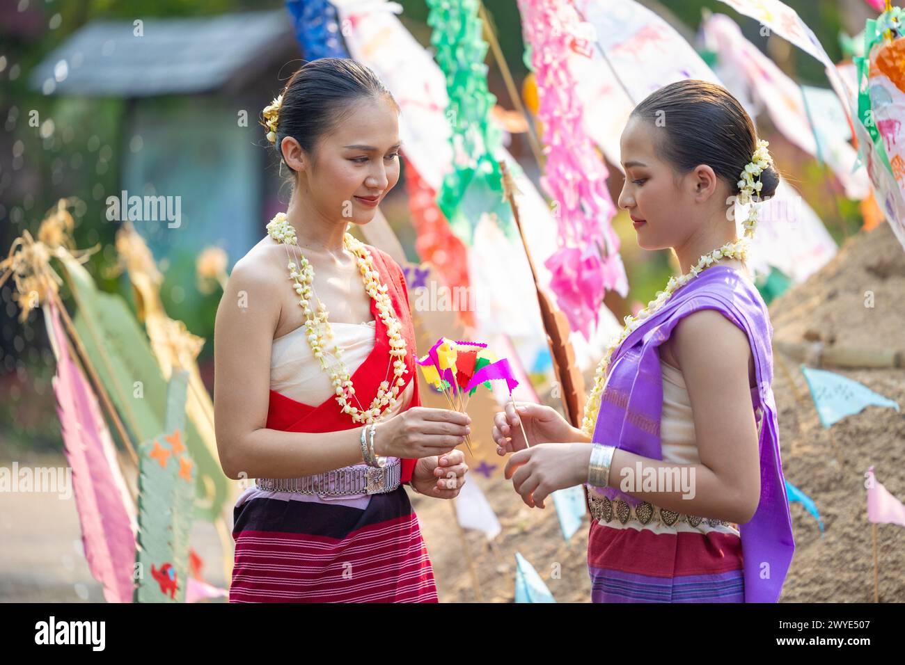 Songkran festival. Northern Thai people in Traditional clothes dressing ...