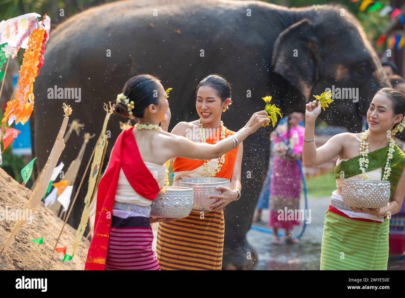 Songkran festival. Northern Thai people in Traditional clothes dressing ...