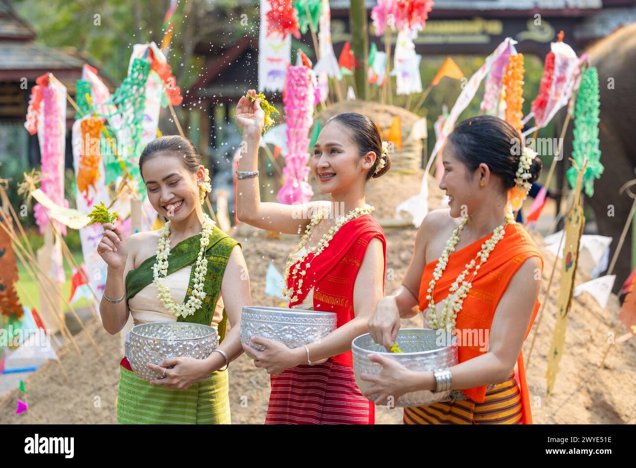 Songkran festival. Northern Thai people in Traditional clothes dressing ...