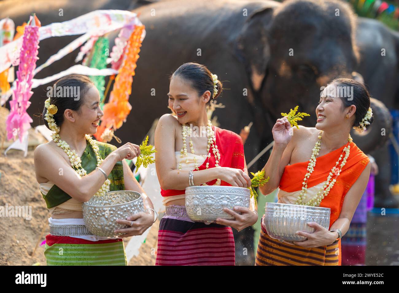 Songkran festival. Northern Thai people in Traditional clothes dressing ...