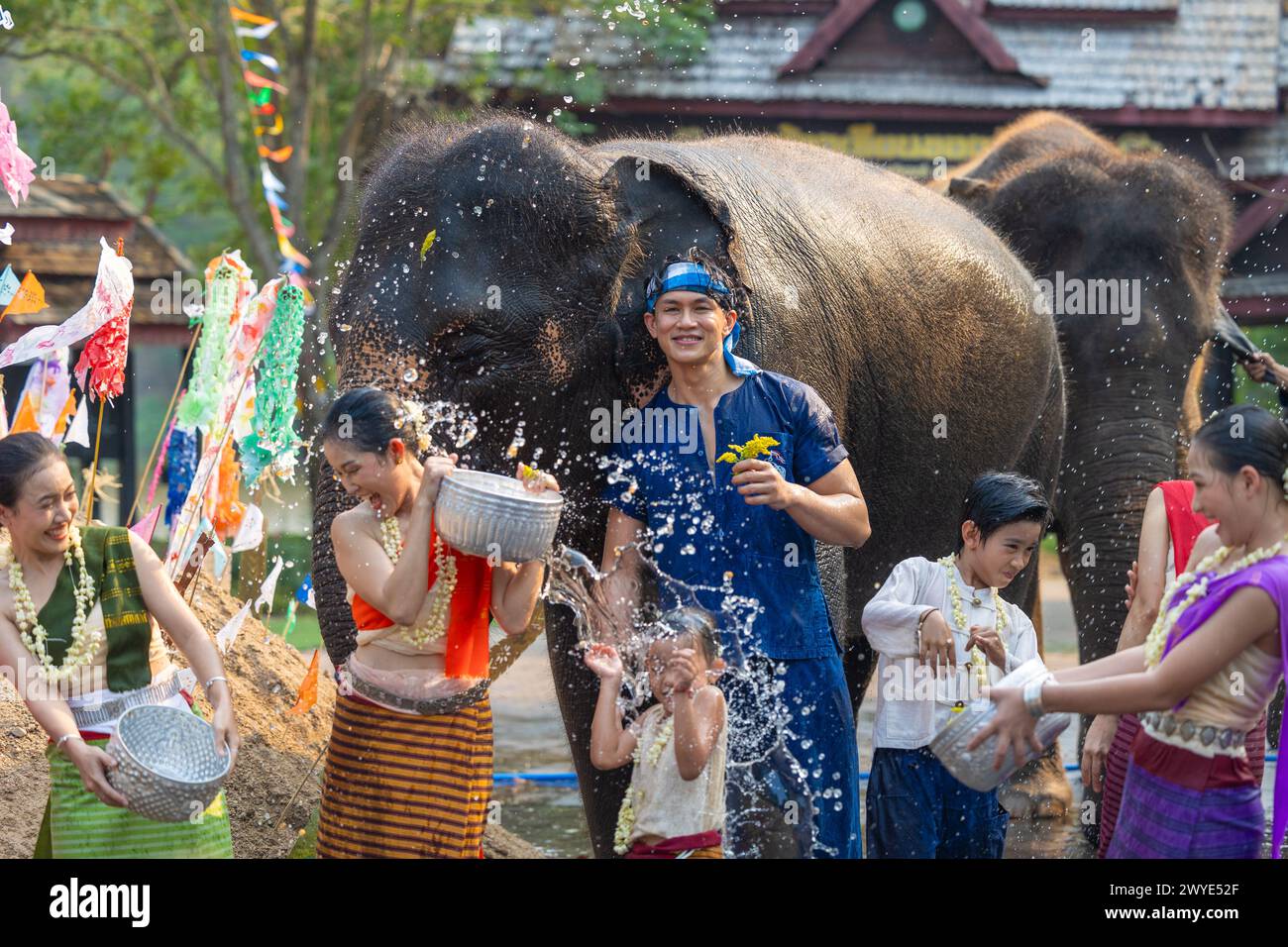 Songkran festival. Northern Thai people in Traditional clothes dressing ...