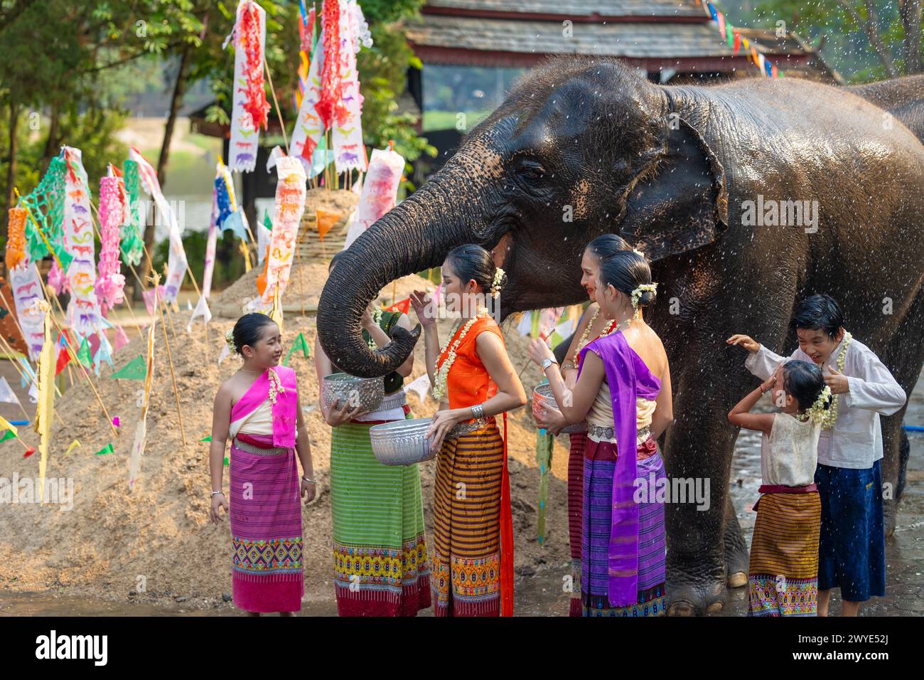 Songkran festival. Northern Thai people in Traditional clothes dressing ...