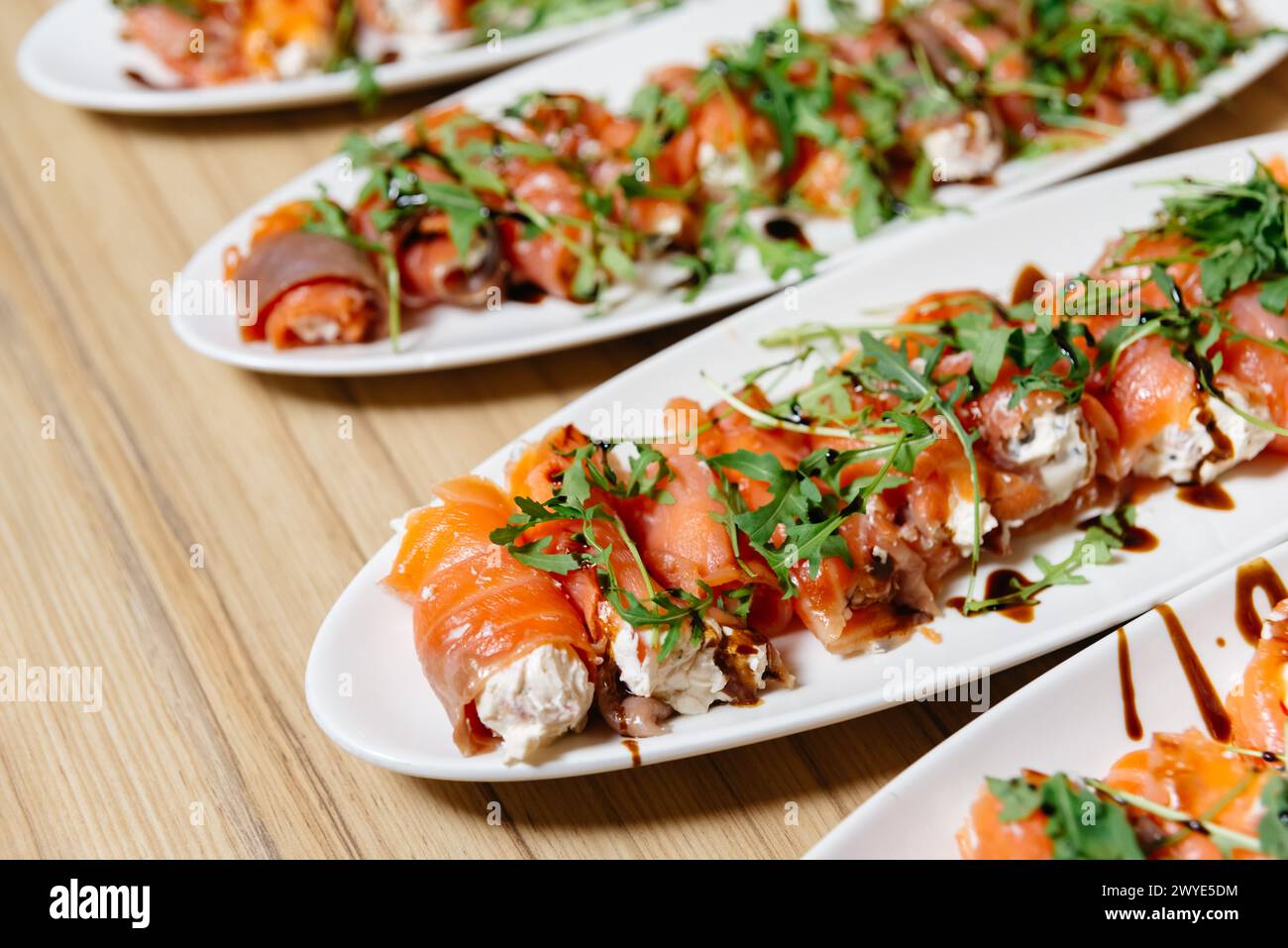 Delectable smoked salmon roll-ups filled with cream cheese and ...