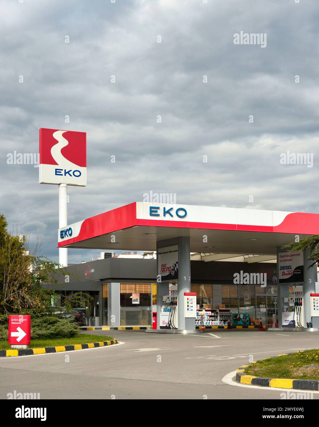 EKO filling station or gas station or petrol station forecourt against dark sky in Sofia ...