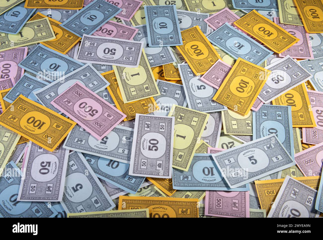 Monopoly Money in a pile, United Kingdom Stock Photo - Alamy