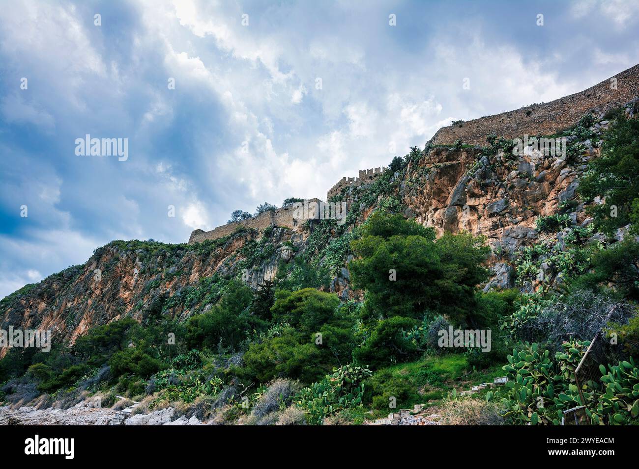 The historical Acronauplia fortress against an overcast sky, in Nafplio ...