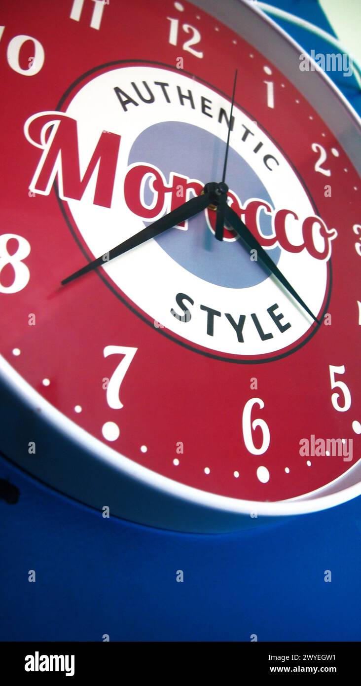 Moroccan red wall clock Stock Photo - Alamy
