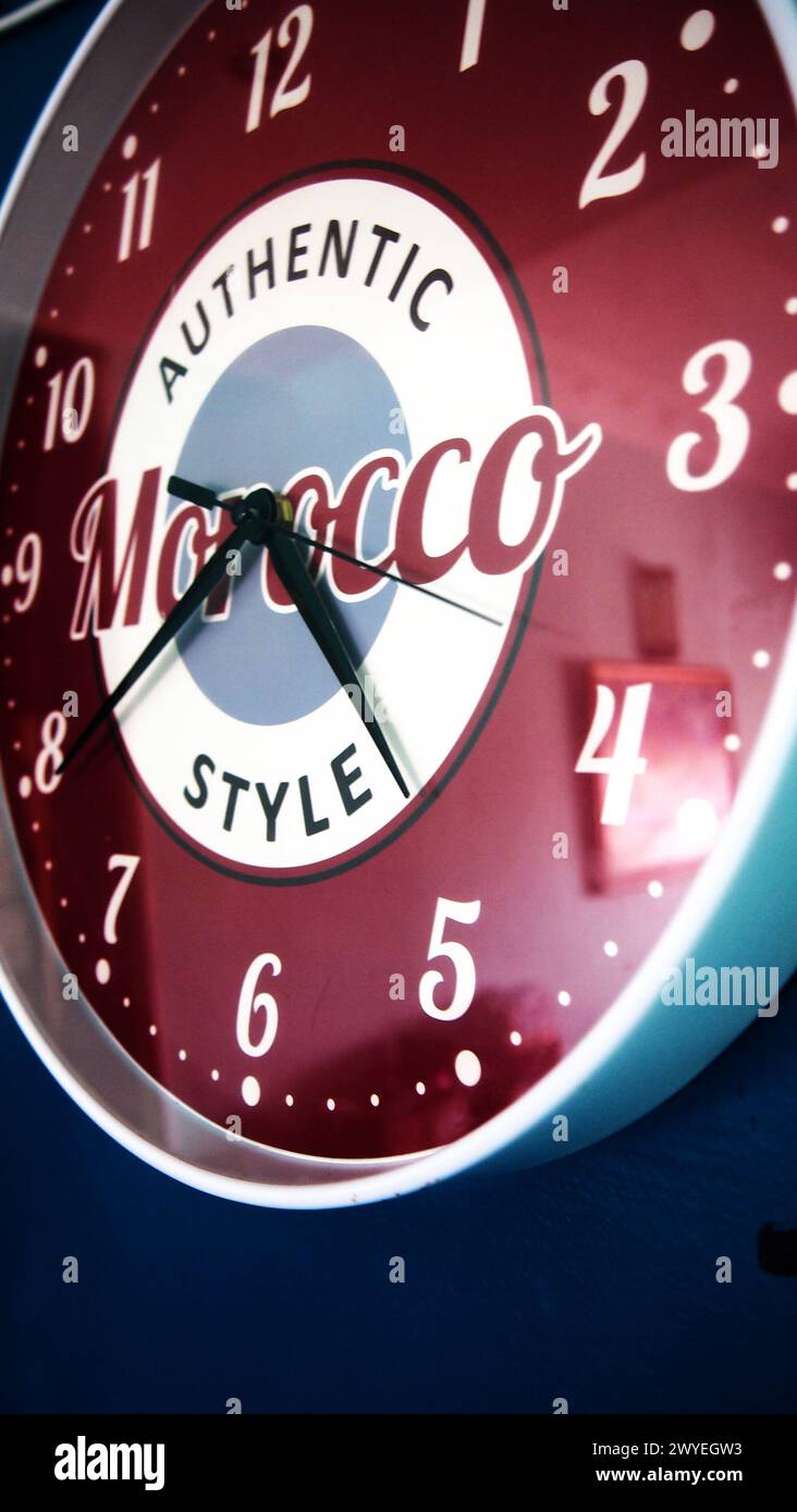 Moroccan red wall clock Stock Photo - Alamy