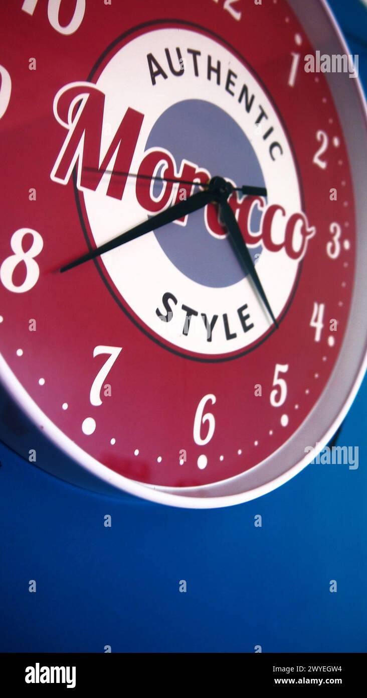 Moroccan red wall clock Stock Photo - Alamy