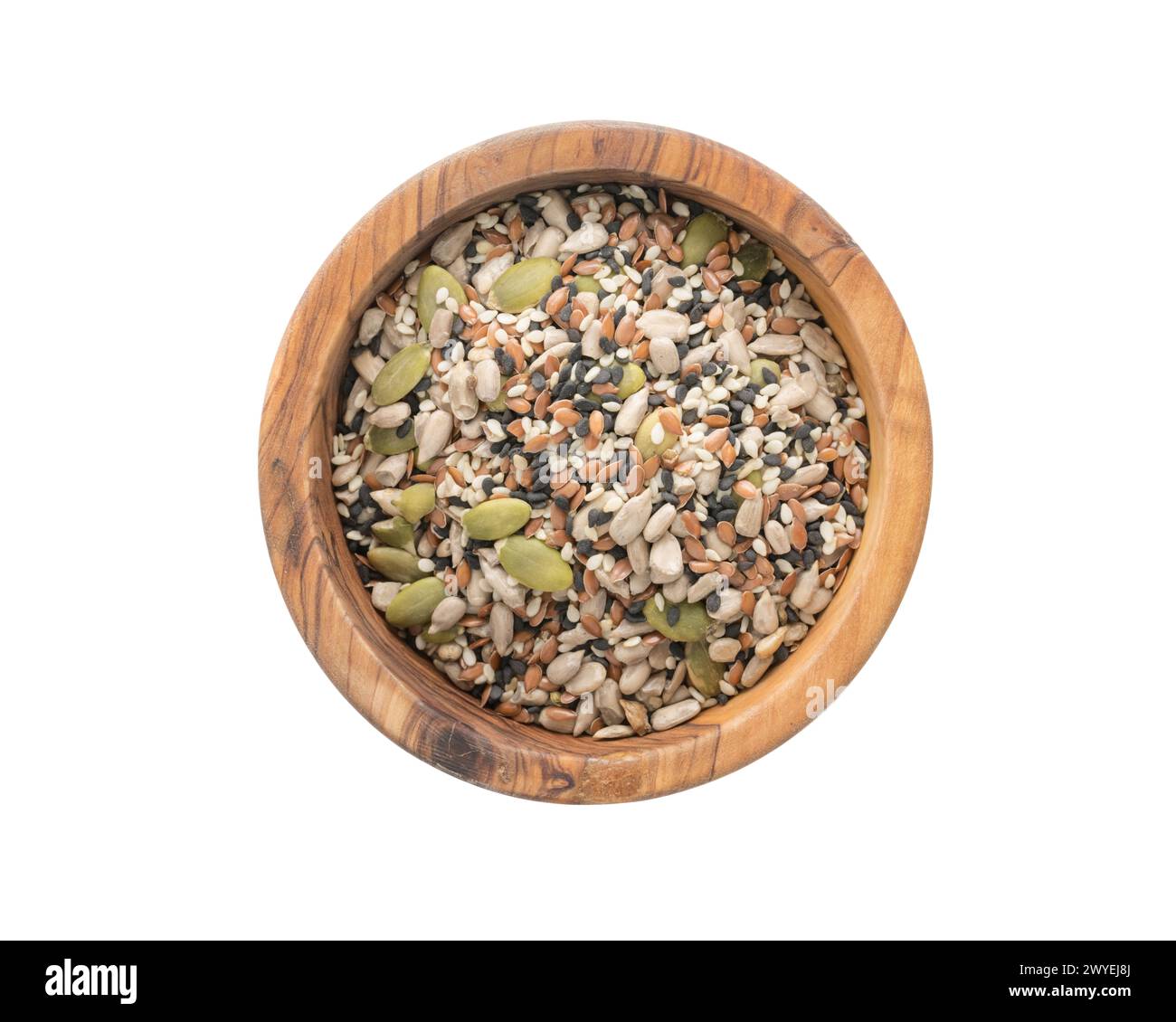 Top view of seed mix for salad in wood bowl isolated on white ...