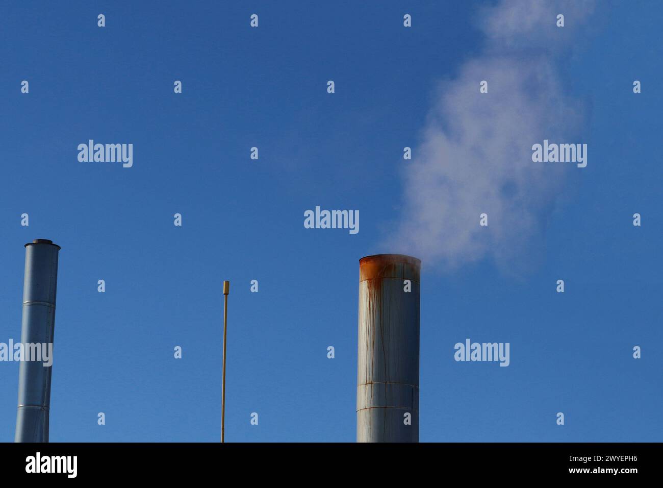 Environmental pollution. Industrial chimneys for exhaust emissions ...
