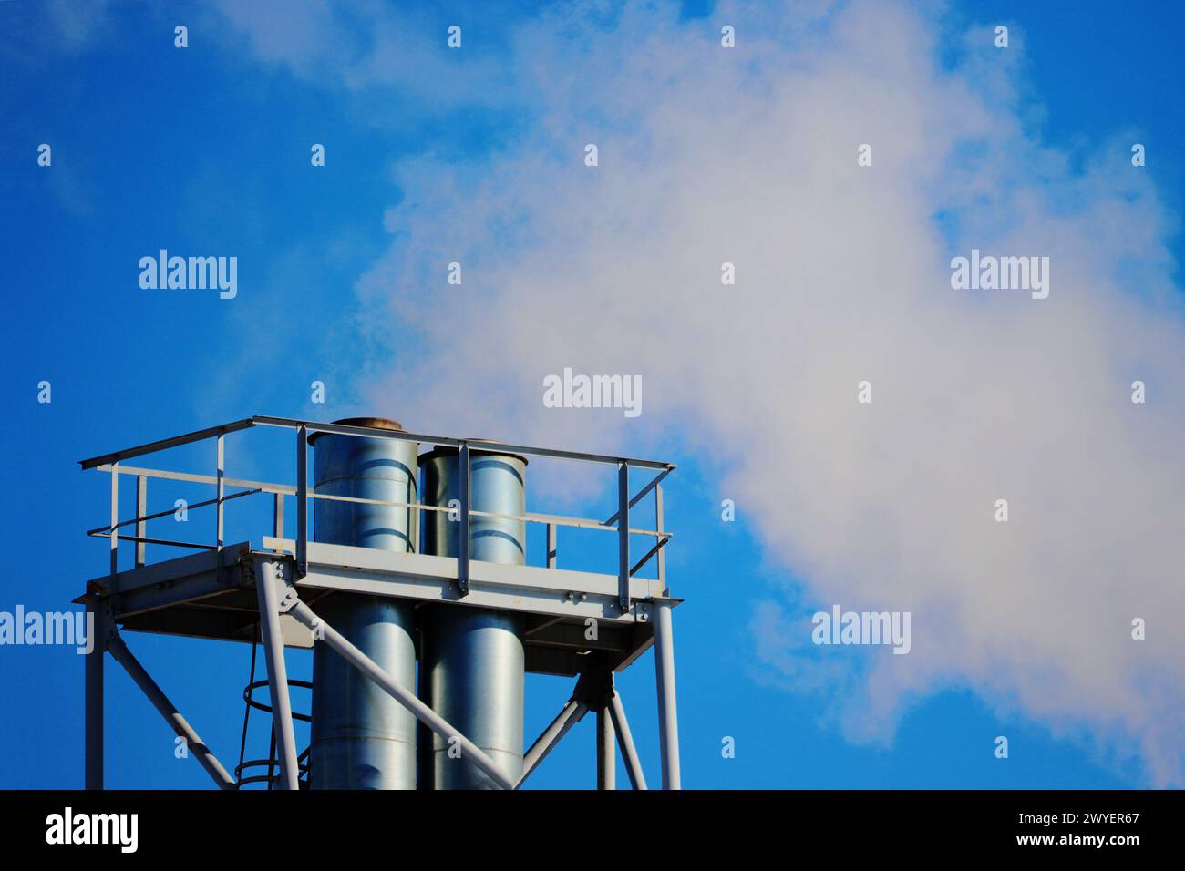 Environmental pollution. Industrial chimneys for exhaust emissions ...