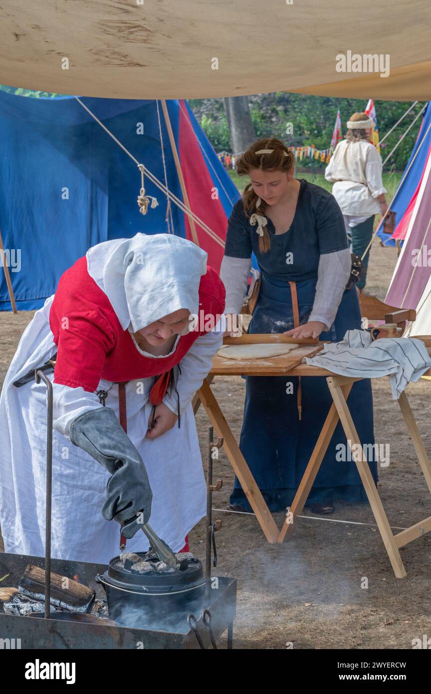 Enactors from the Bowlore troupe in medieval period costume at their ...