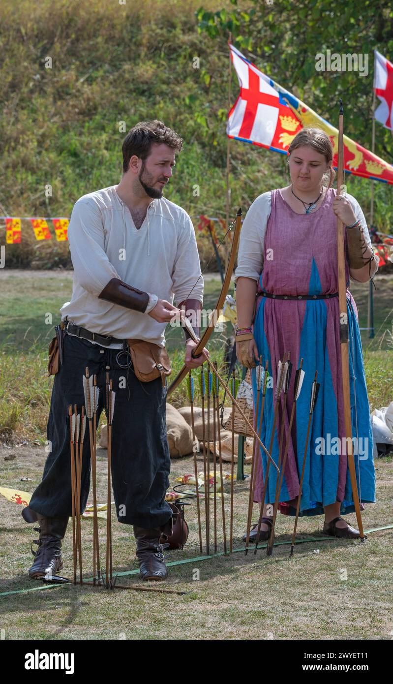 Enactors from the Bowlore troupe in medieval period costume at their ...