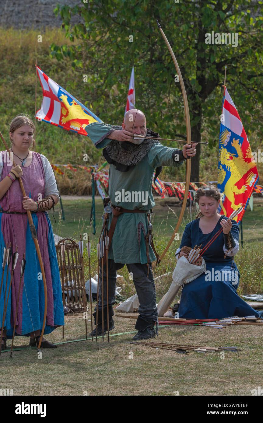 Enactors from the Bowlore troupe in medieval period costume at their ...