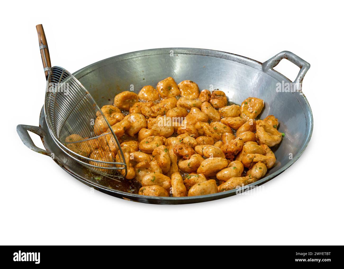 Die cut of Fried Fish Cake in a pan on white isolated Stock Photo - Alamy