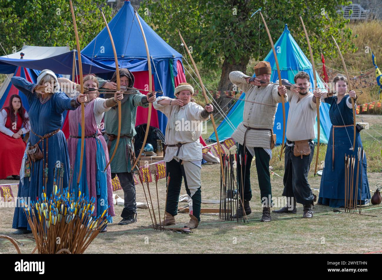 Enactors from the Bowlore troupe in medieval period costume at their ...