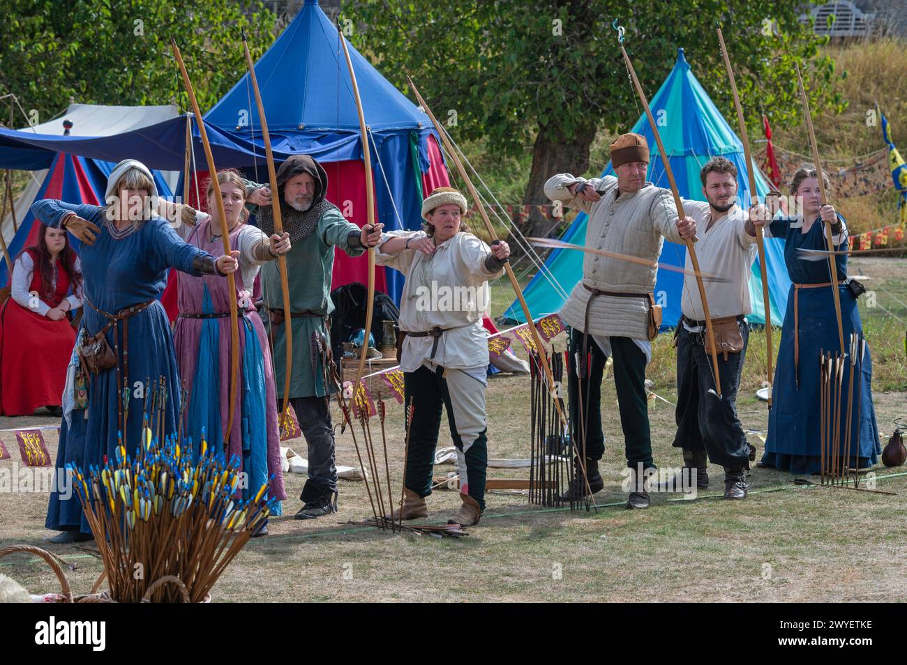 Enactors from the Bowlore troupe in medieval period costume at their ...