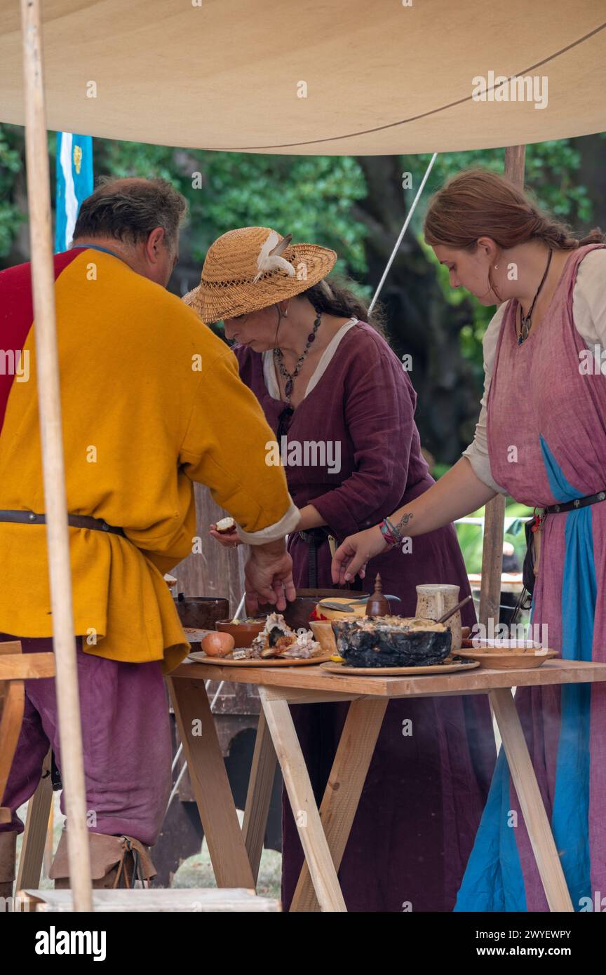 Enactors from the Bowlore troupe in medieval period costume at their ...