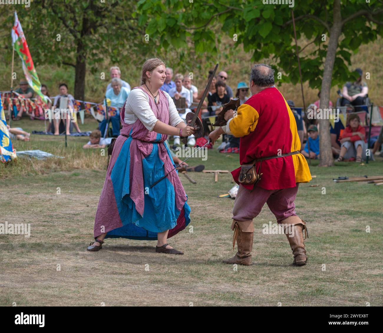 Enactors from the Bowlore troupe in medieval period costume at their ...